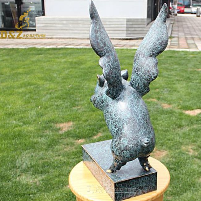 Large flying pig outdoor garden statue